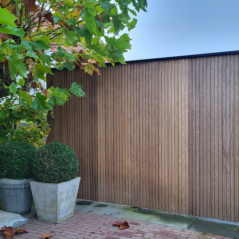 Lange tuinwand in Thermo Fraké Select | Outdoor Wood Concepts