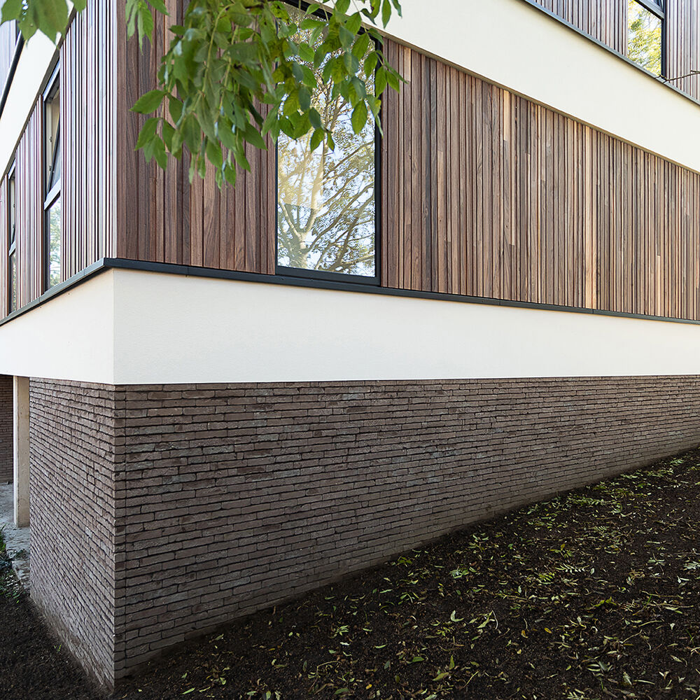 Drie woningen bekleed met Padoek bekleding | Outdoor Wood Concepts