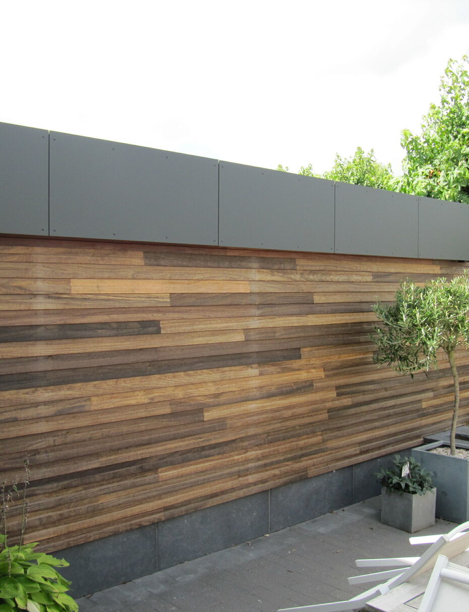 Drie woningen bekleed met Padoek bekleding | Outdoor Wood Concepts